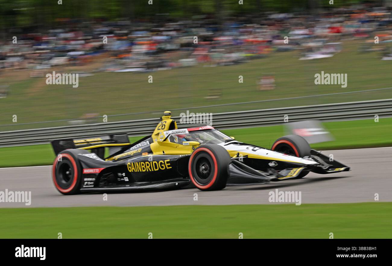 IndyCar driver Colton Herta drives past the fans at the Children's of ...