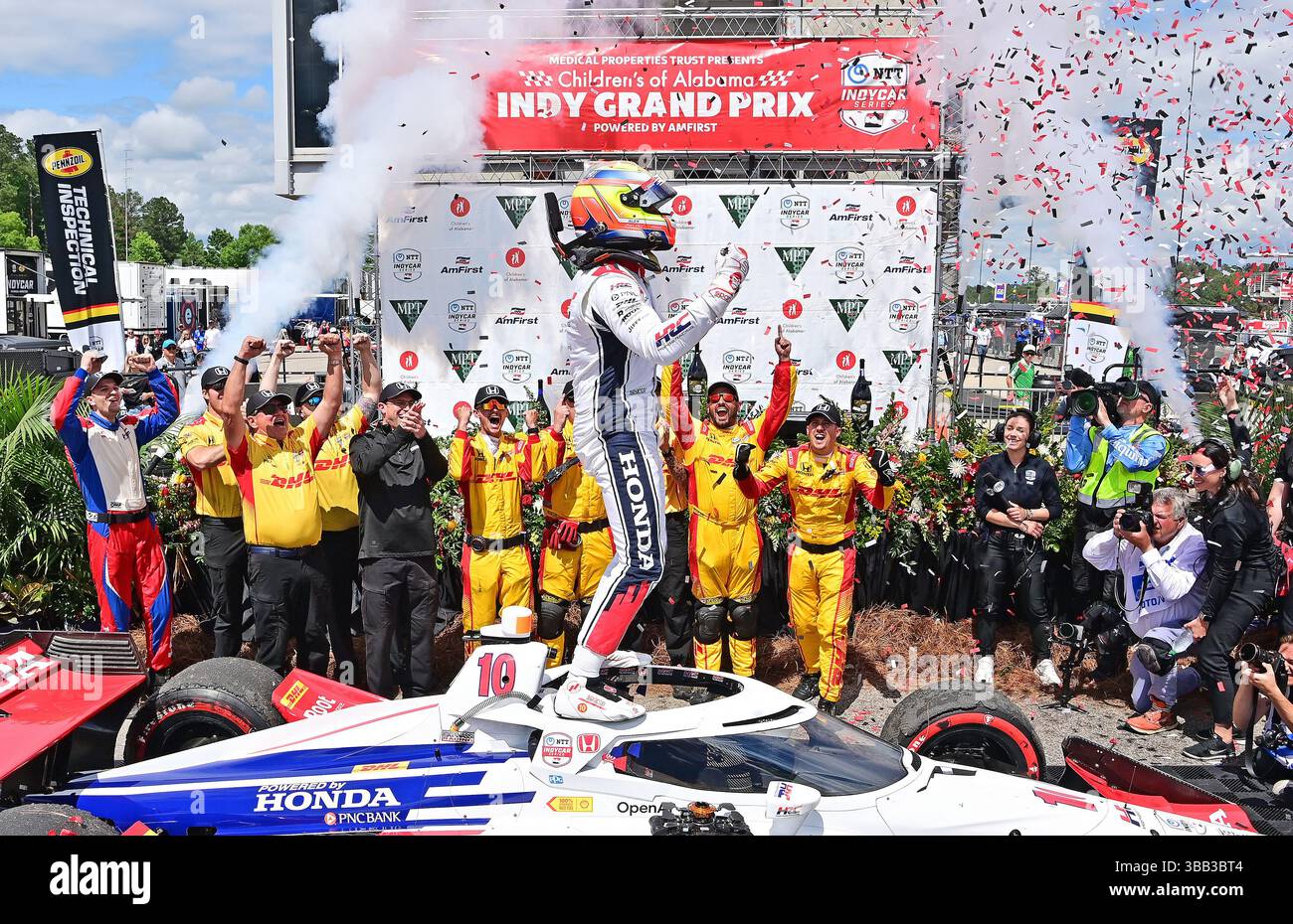IndyCar driver Alex Palou celebrate's in Victory Lane at the Children's ...