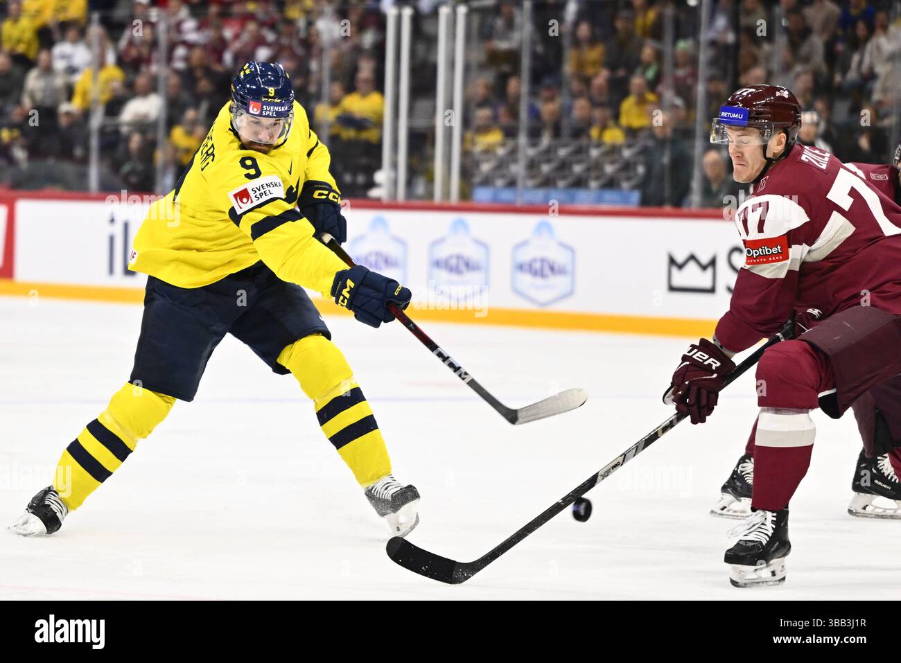 STOCKHOLM, SWEDEN 20250514Sweden's Filip Forsberg and Latvia's Kristaps ...