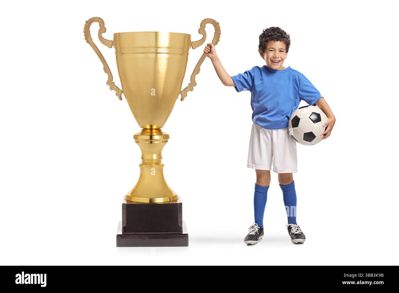 Kid football player with a big gold tropy cup isolated on white ...