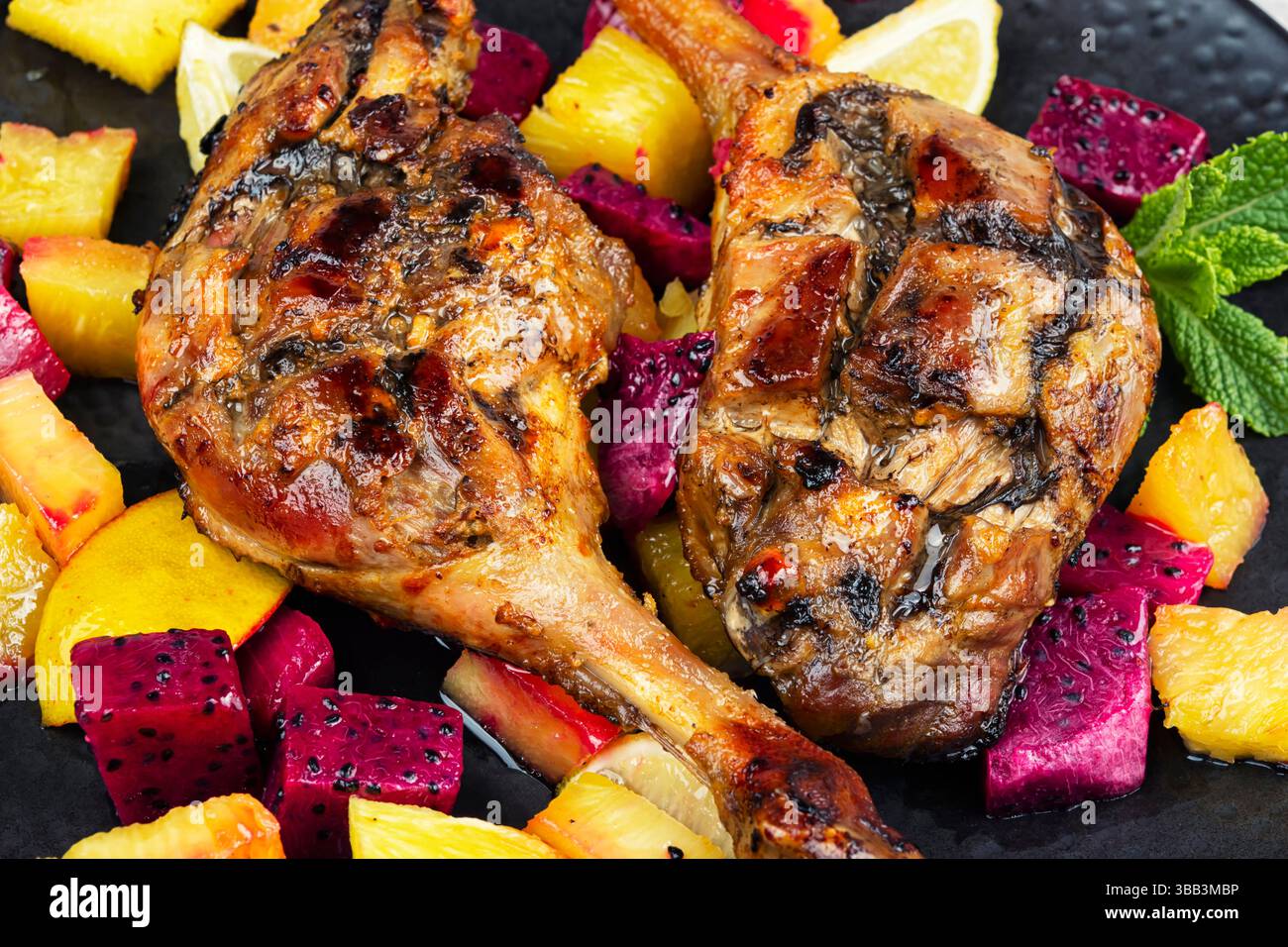 Two duck legs baked in a fruit marinade. Food photography. Macro Stock ...