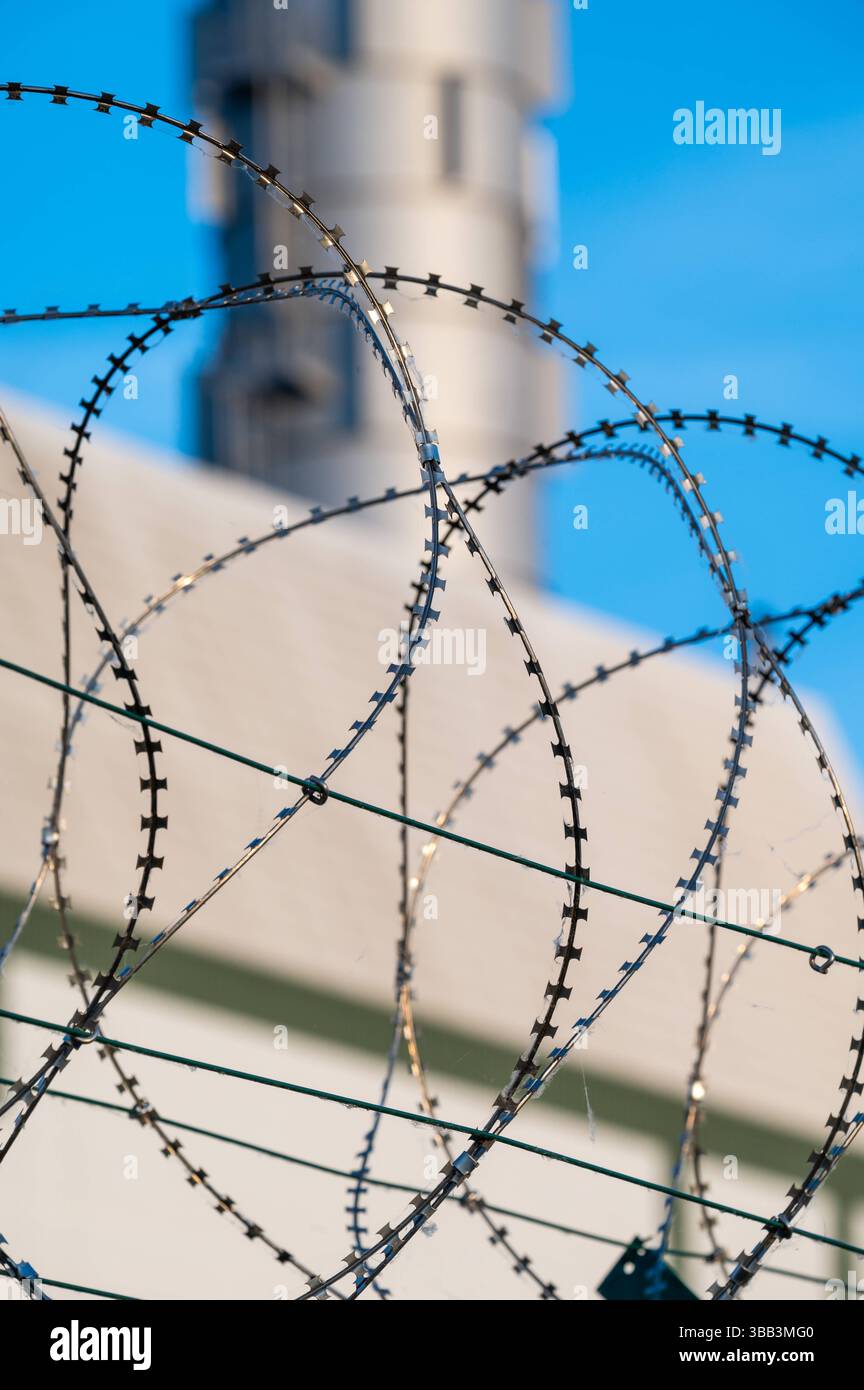 Barbed wire and security fence at the Engie Electrabel power plant ...