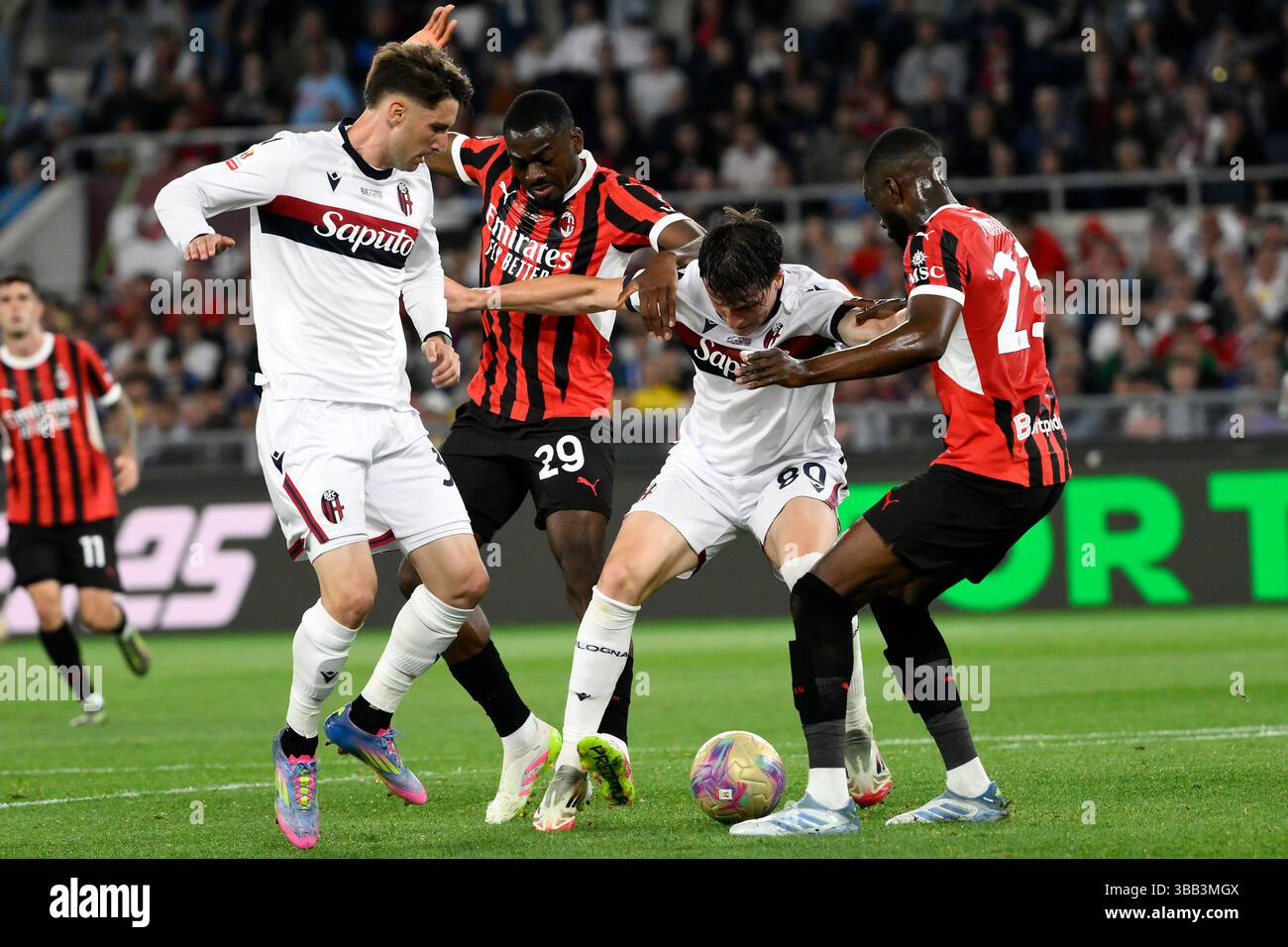 Rome, Italy. 14th May, 2025. Juan Miranda of Bologna FC, Youssouf ...