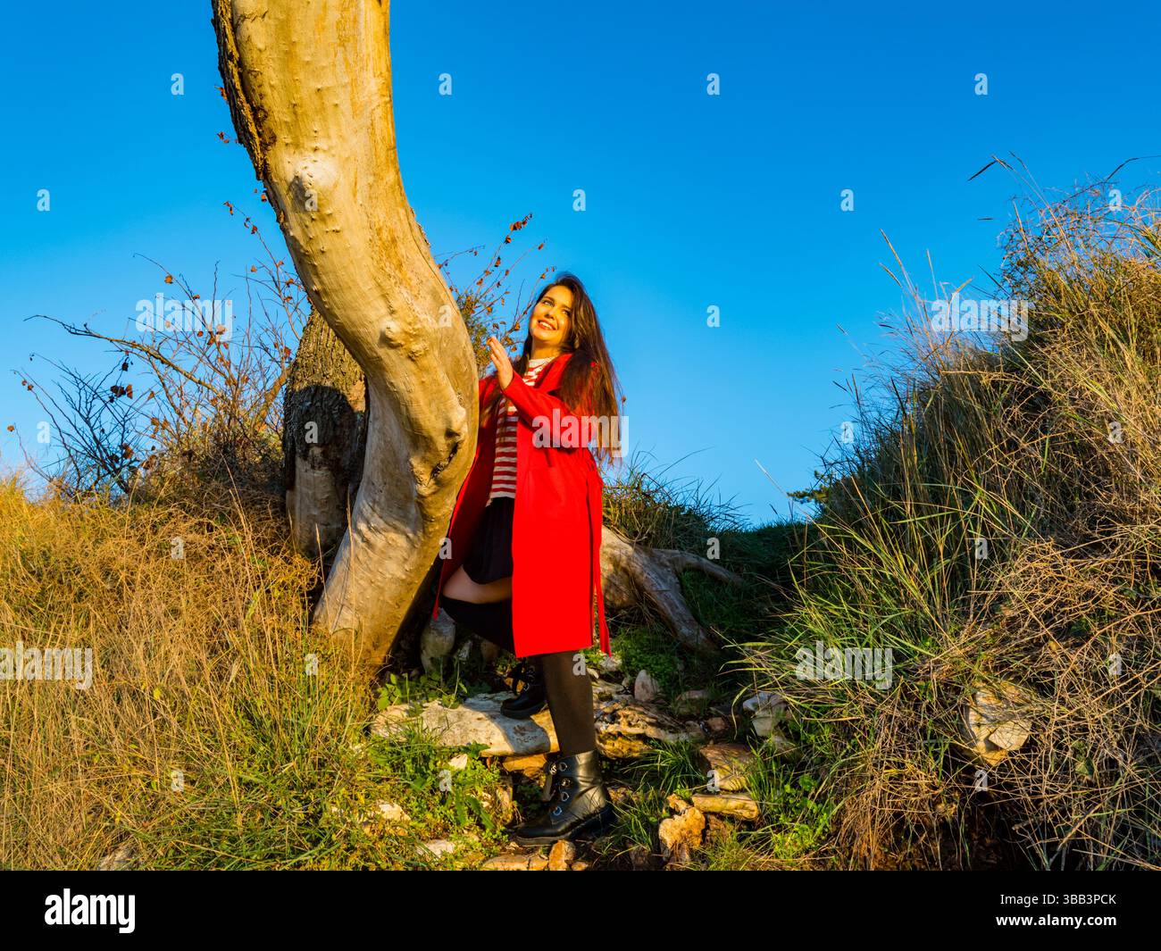 25-30 years young woman Red rifing hood coat Stock Photo - Alamy