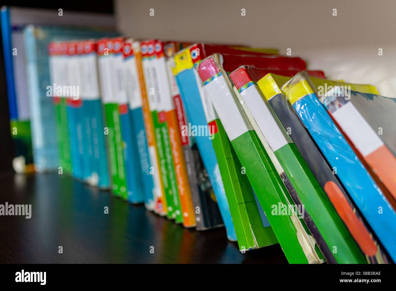 Various types of books on a library shelf. Education Stock Photo - Alamy