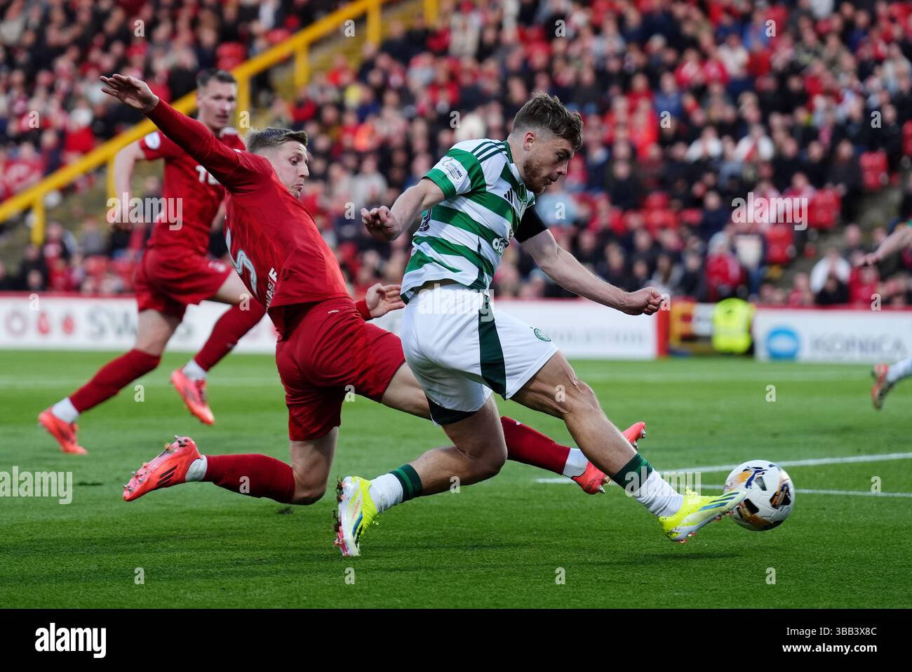 Celtic's James Forrest (right) assists Yang Hyun-Jun (not pictured) in ...