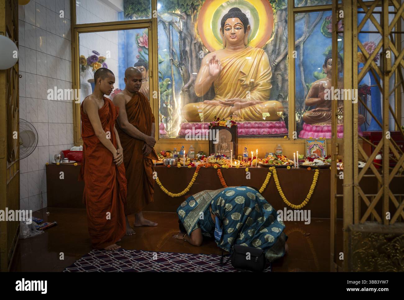 Devotees pray to Lord Buddha on the occasion of Buddha Purnima or Vesak ...
