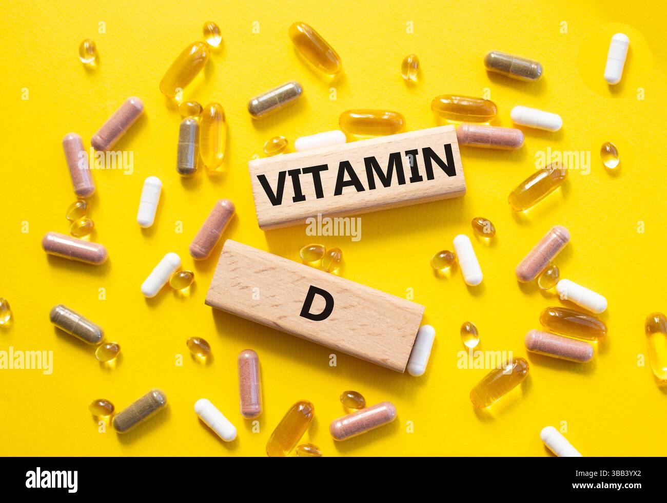 Vitamin D symbol. Concept word Vitamin D on wooden blocks. Beautiful ...