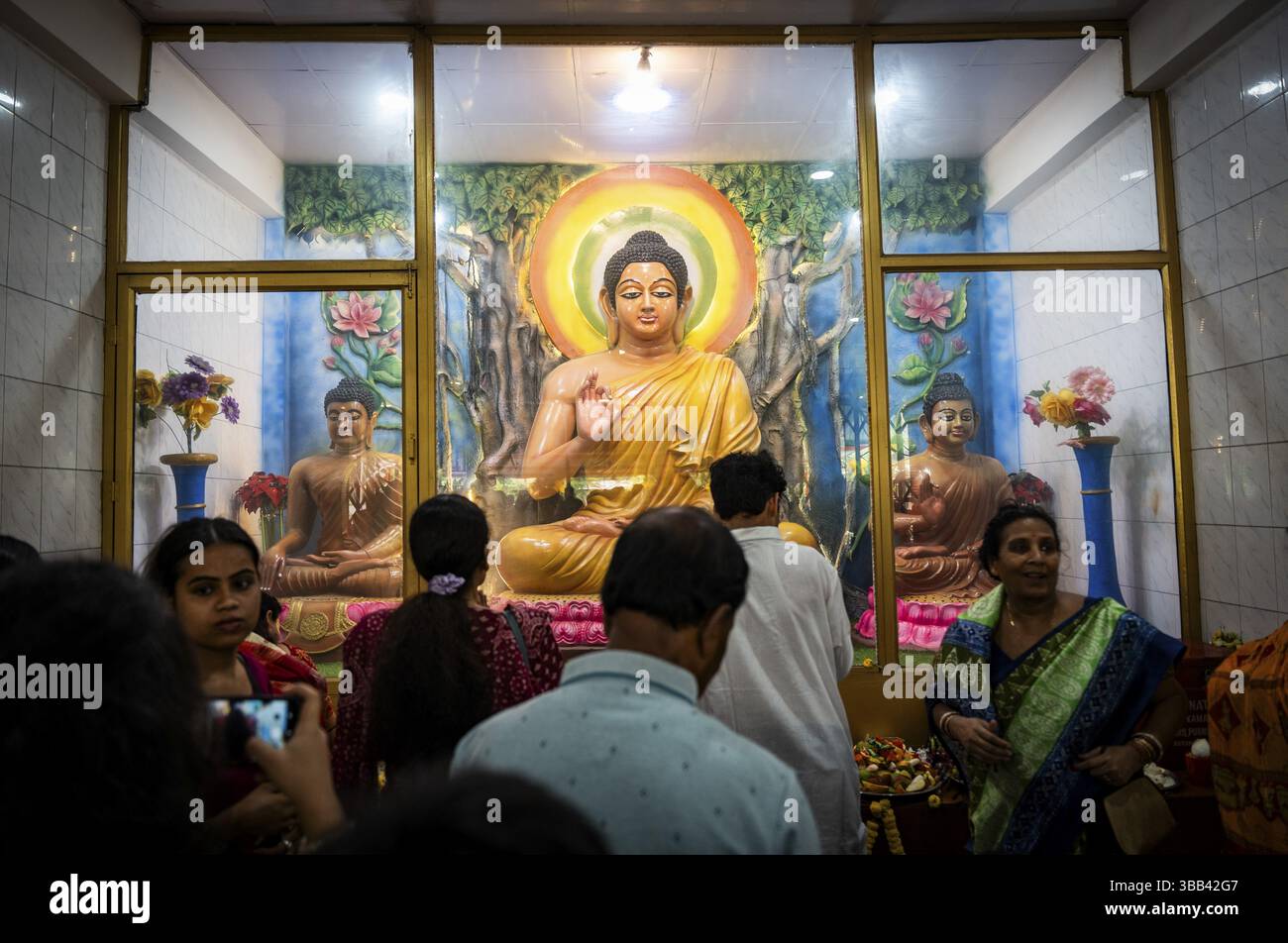 Devotees pray to Lord Buddha on the occasion of Buddha Purnima or Vesak ...