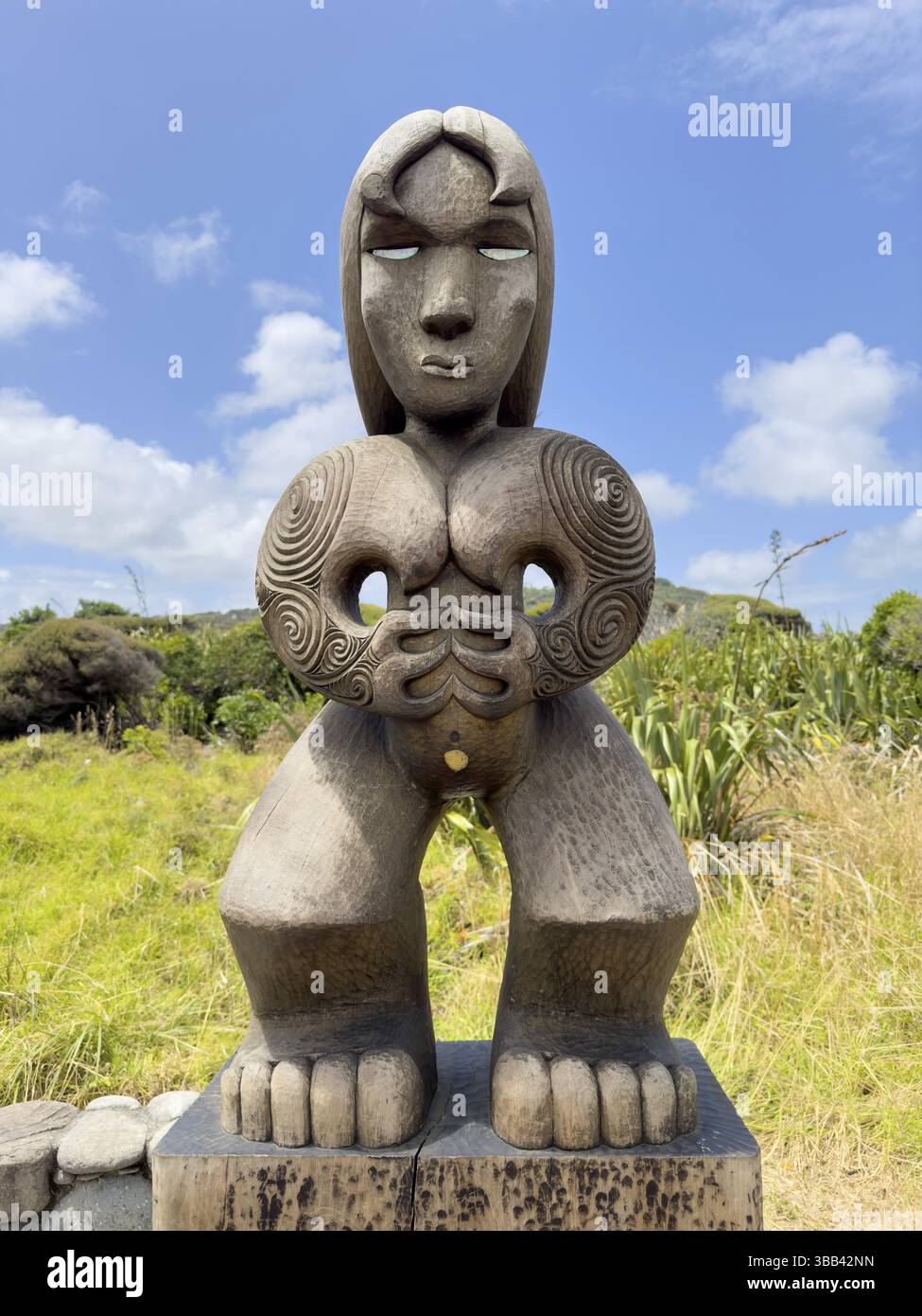 Wooden figure of Hinerangi Pou at Mercer Bay Loop Walk Lookout, North ...