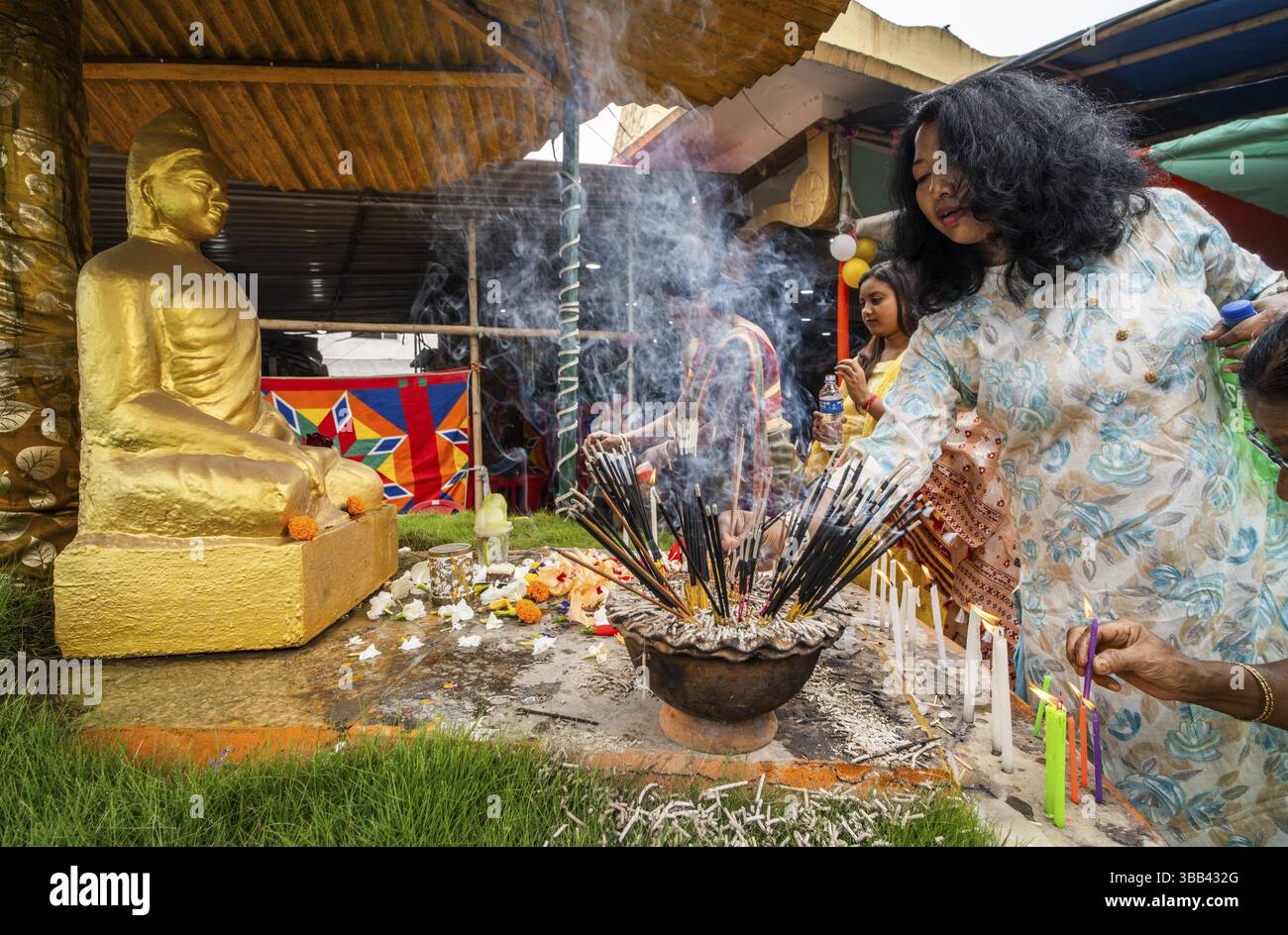 Devotees pray to Lord Buddha on the occasion of Buddha Purnima or Vesak ...