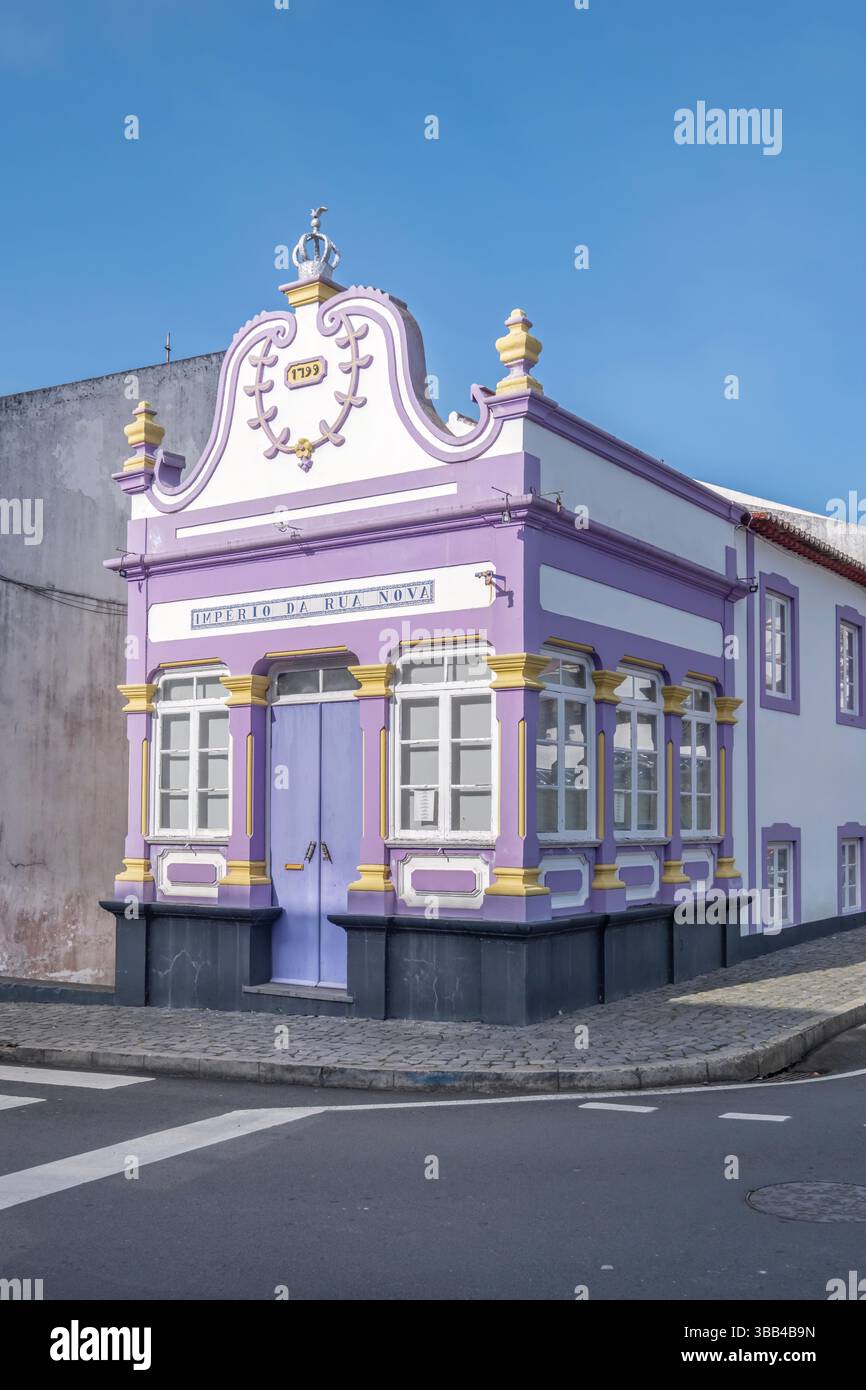 Colorful facade of a traditional Empire of the Holy Spirit with purple ...