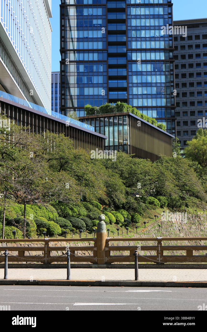 View of Benkei Bridge with modern glass exterior buildings on top of ...