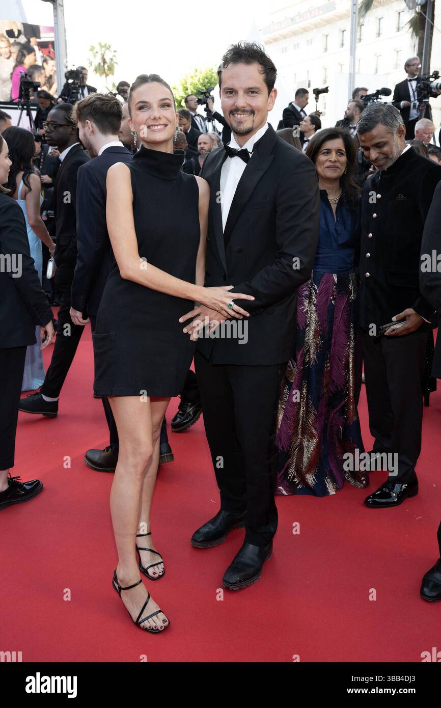 Cannes, France. 14th May, 2025. Cassandre Verdier and Juan Arbelaez attend the Mission ...