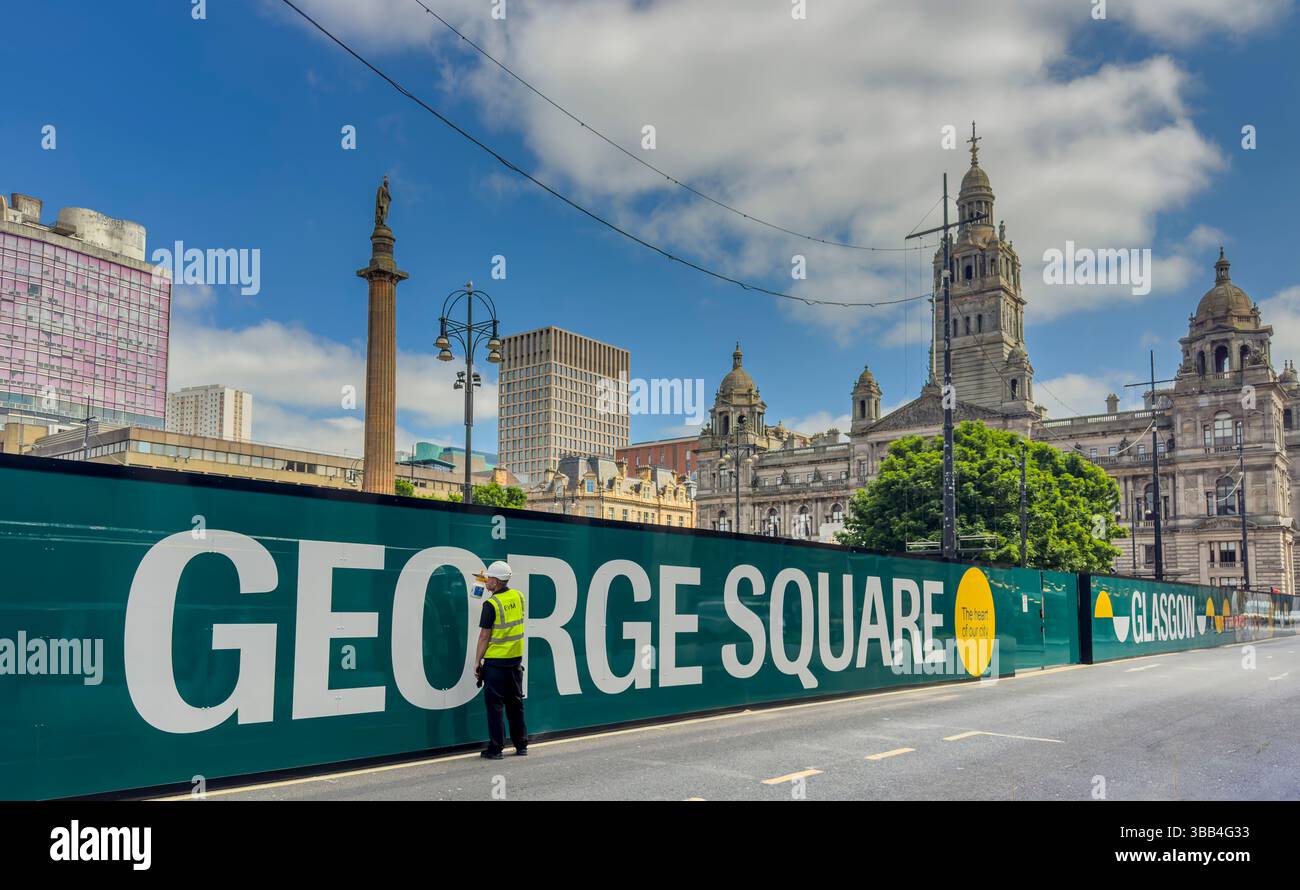George Square, Glasgow, UK. 14th May, 2025. A worker cleans down the ...