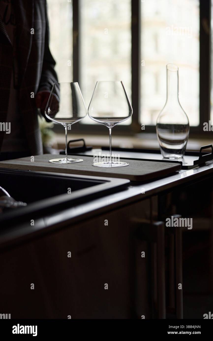 Clean wine glasses and decanter are on the table of a special wine ...