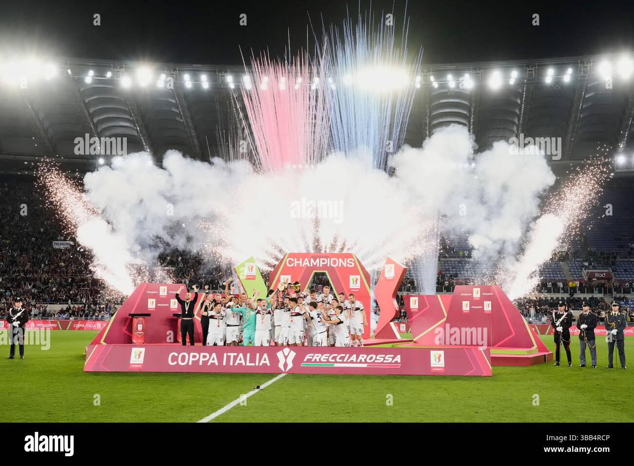 Bologna's team players celebrate with the trophy after the Italian Cup ...