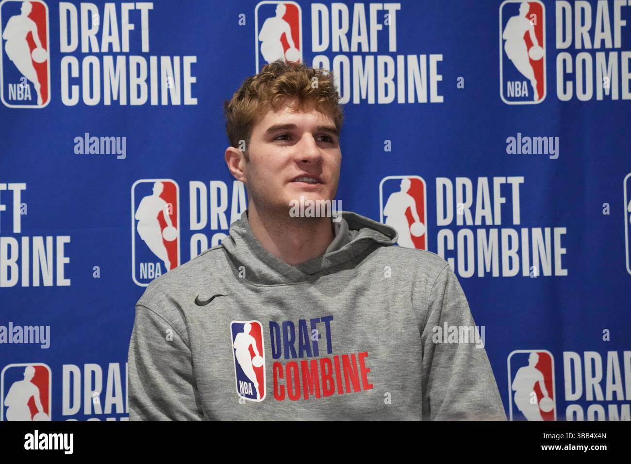 Liam McNeeley talks to media at the 2025 NBA basketball Draft Combine ...
