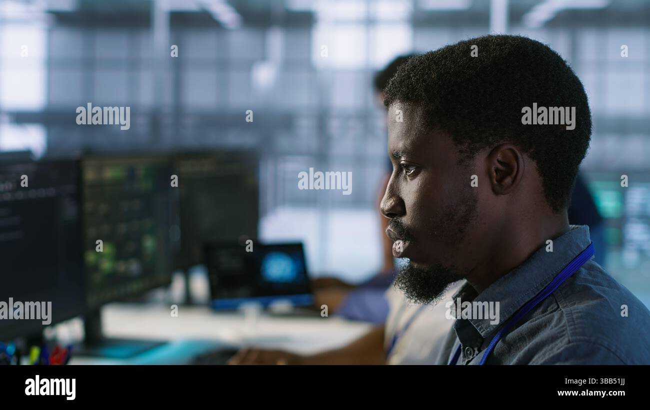 Software developers in data center implementing AI predictive maintenance systems. Focus on man ...