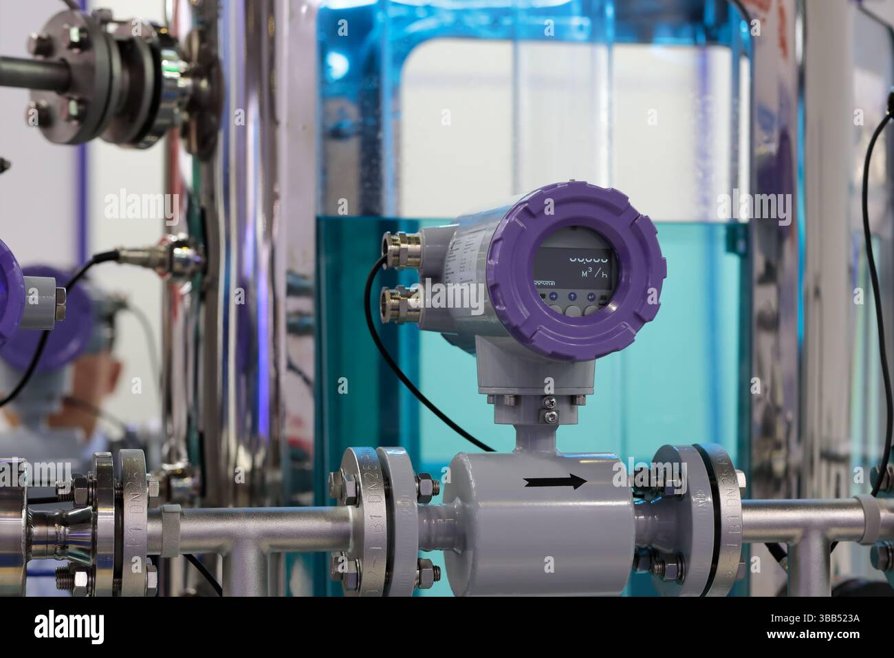 Industrial pipeline with digital flow rate meter. Selective focus Stock ...