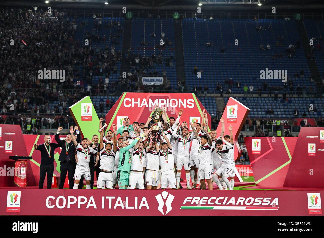 Bologna FC players lift the Italian Cup trophy as they celebrate on the ...