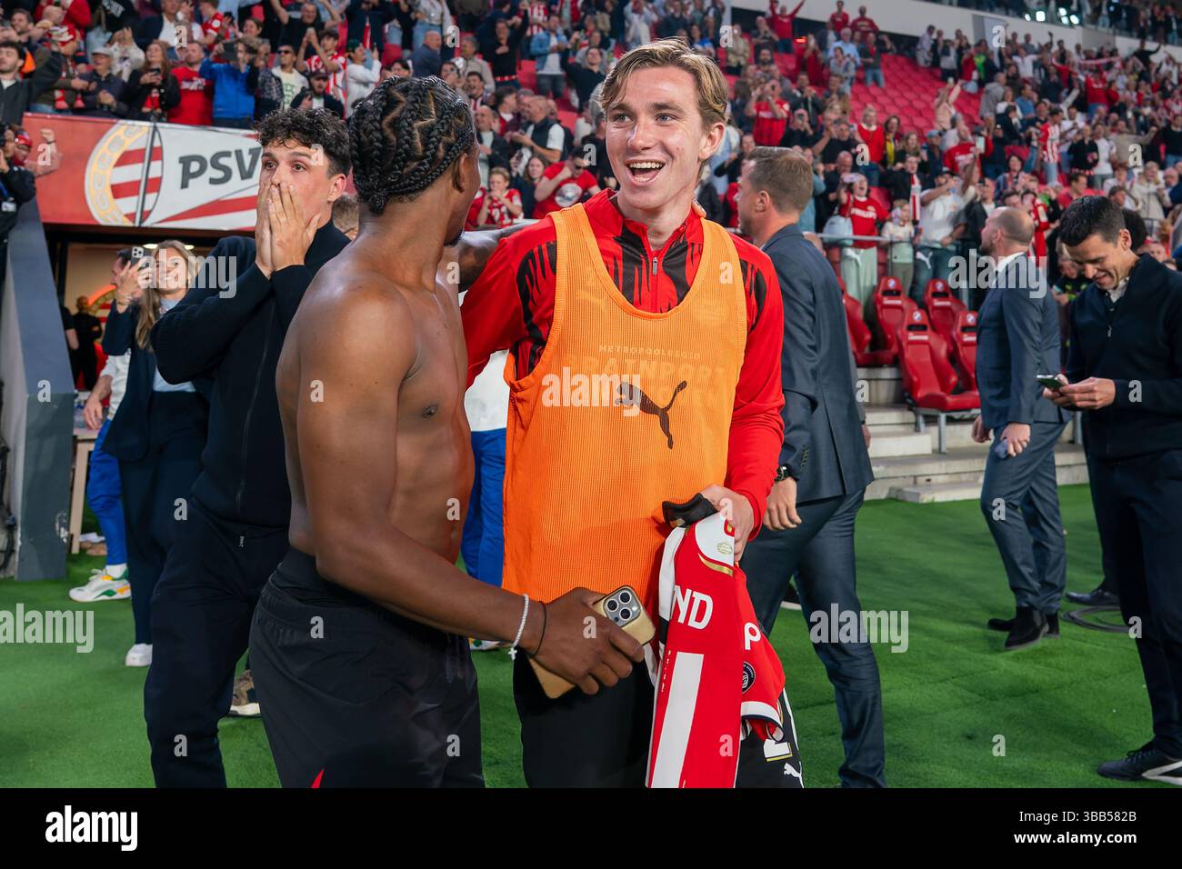 EINDHOVEN, NETHERLANDS - MAY 14: Tyrell Malacia of PSV interacts with ...