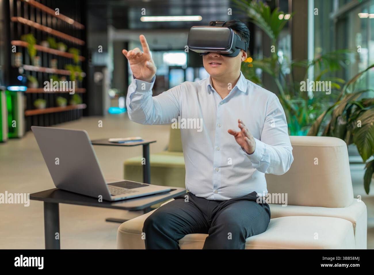 Middle-aged businessman programmer software developer using headset app making a presentation ...