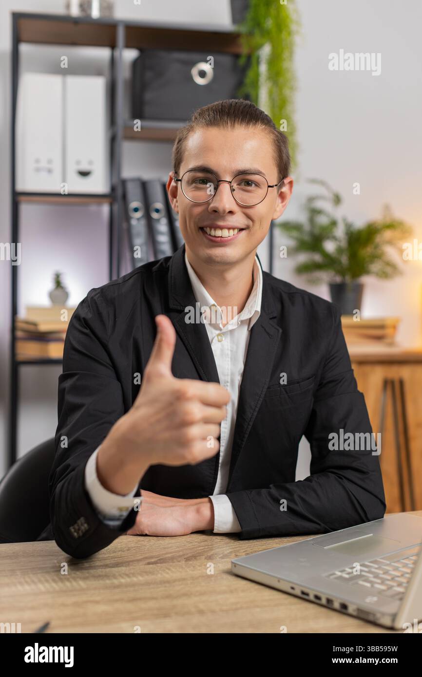 Happy overjoyed young Caucasian man excited winner with laptop ...