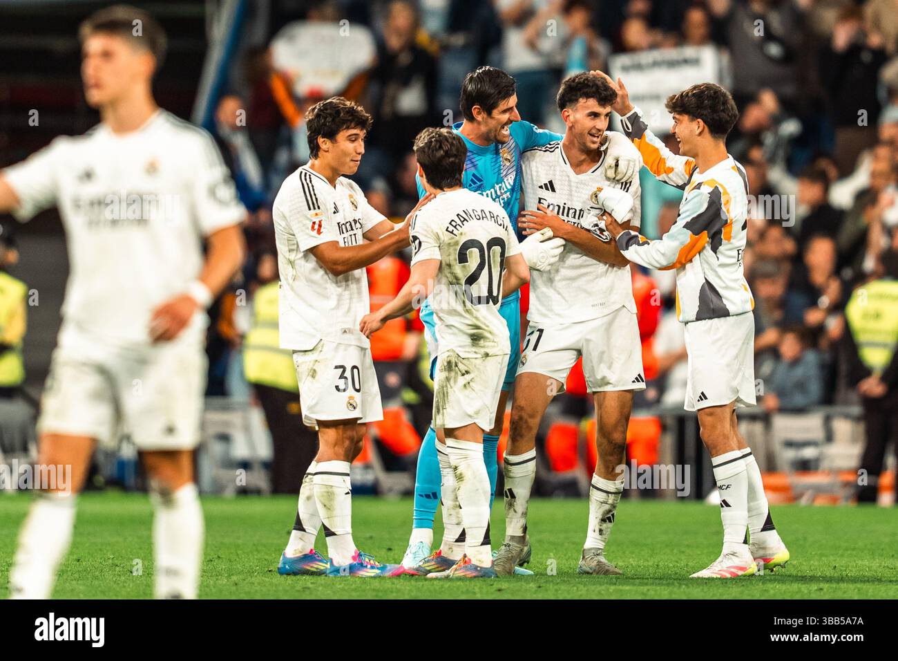 Jacobo Ramon of Real Madrid CF celebrating his goal with his teammates ...