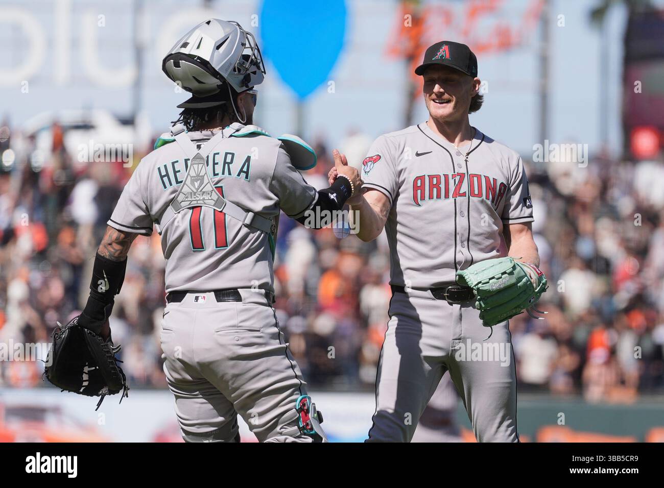 Arizona Diamondbacks catcher Jose Herrera, left, celebrates with ...