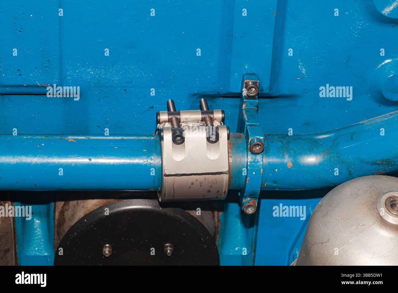 Connecting steel pipes on a marine diesel generator Stock Photo - Alamy