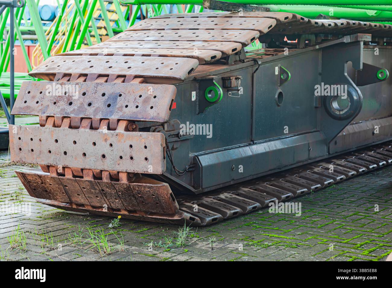 Metal tracks of a crawler cranes with steel wheels. Chassis tracked ...