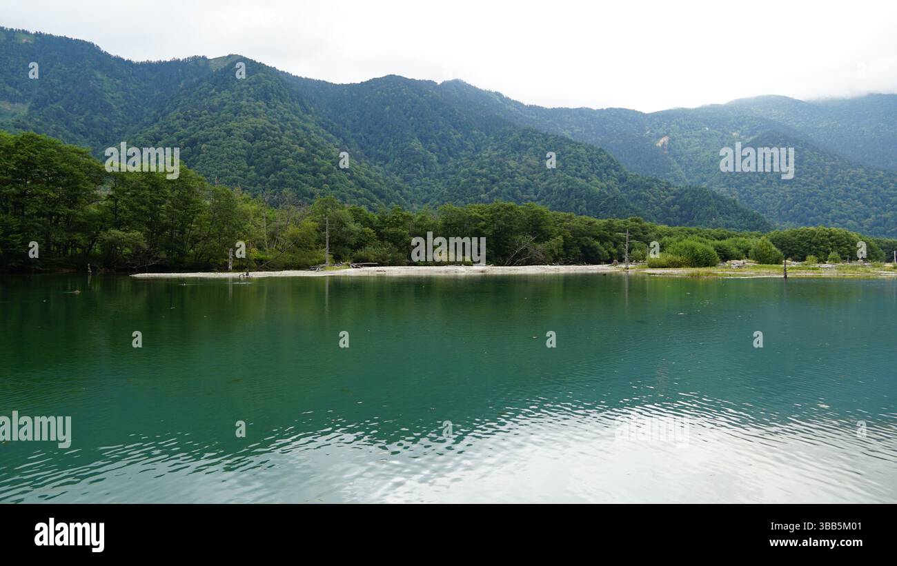Summer Hiking Adventure on Mt. Yakedake in Kamikochi, Japan Stock Photo ...