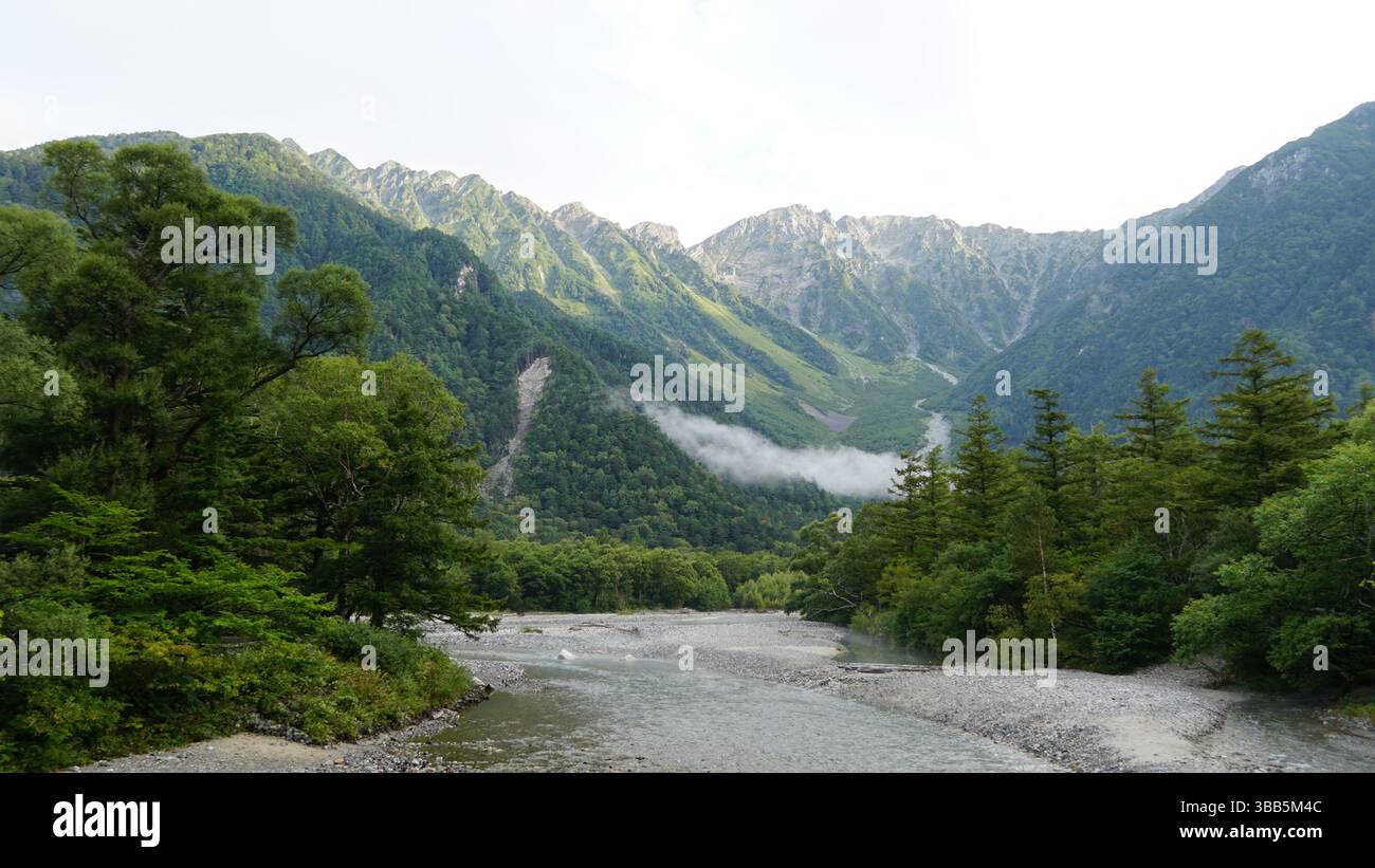Summer Hiking Adventure on Mt. Yakedake in Kamikochi, Japan Stock Photo ...
