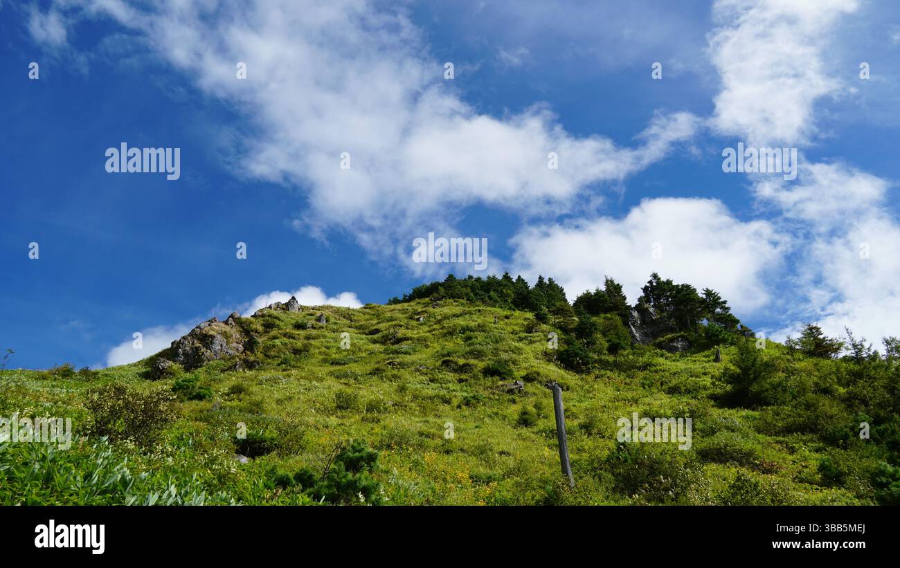 Summer Hiking Adventure on Mt. Yakedake in Kamikochi, Japan Stock Photo ...