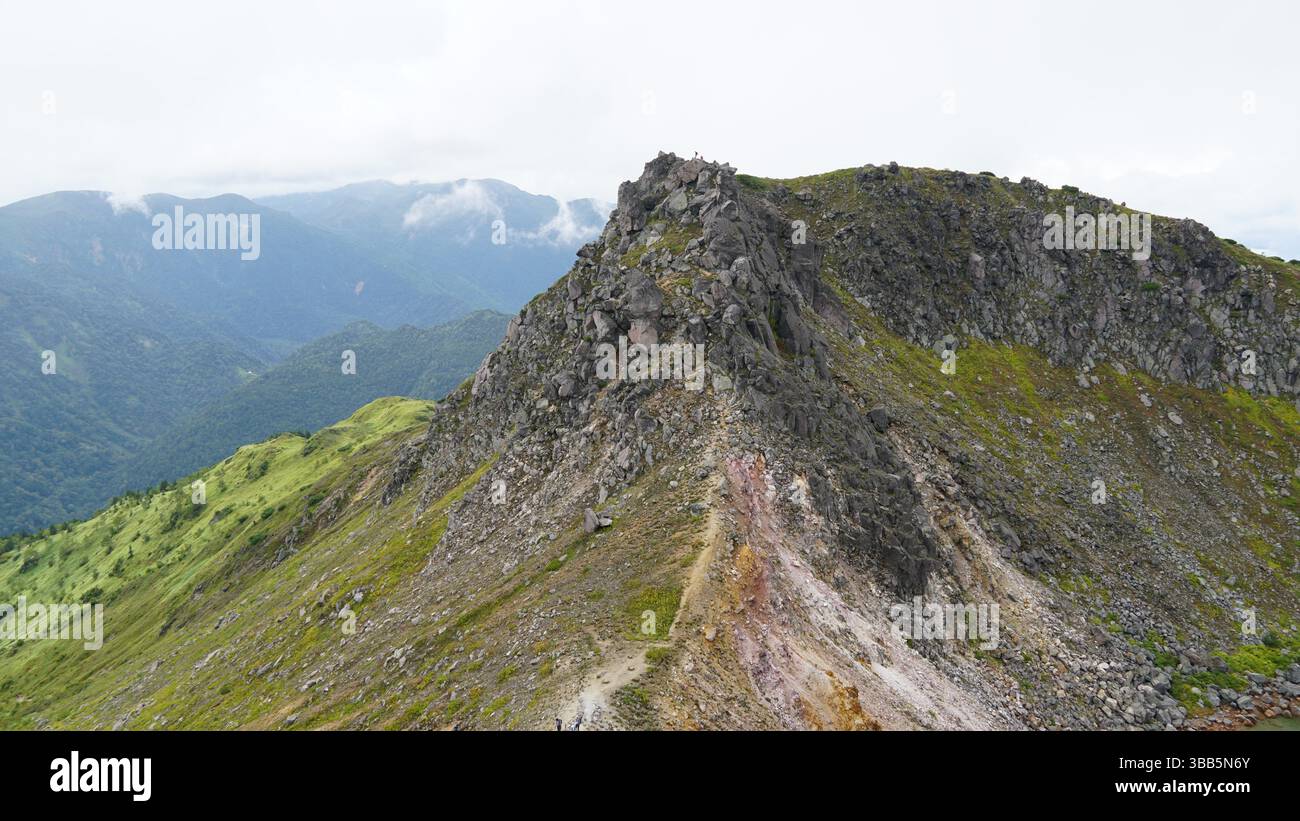 Summer Hiking Adventure on Mt. Yakedake in Kamikochi, Japan Stock Photo ...