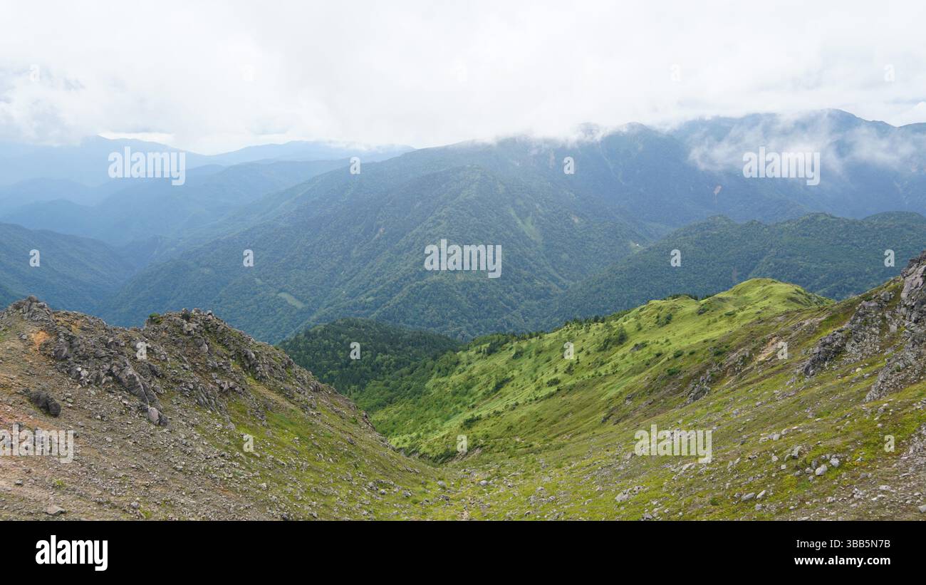 Summer Hiking Adventure on Mt. Yakedake in Kamikochi, Japan Stock Photo ...