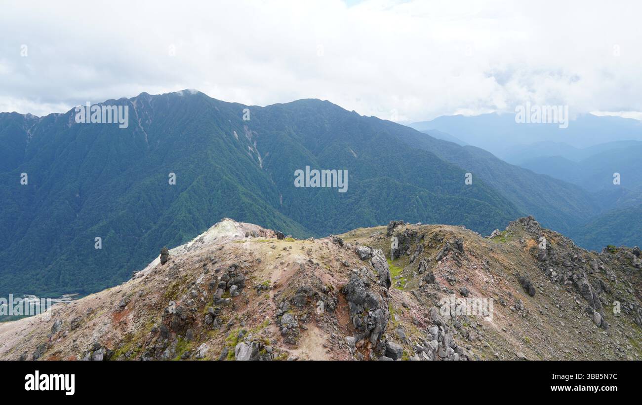 Summer Hiking Adventure on Mt. Yakedake in Kamikochi, Japan Stock Photo ...