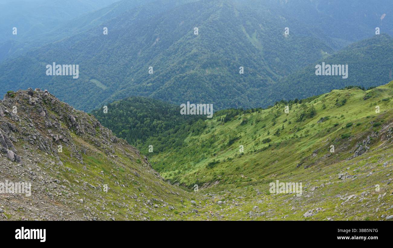 Summer Hiking Adventure on Mt. Yakedake in Kamikochi, Japan Stock Photo ...