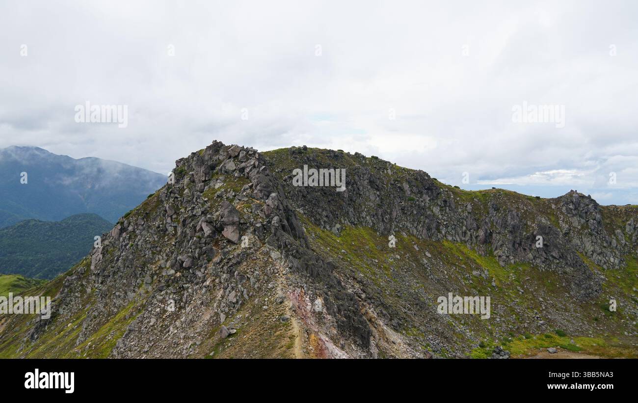 Summer Hiking Adventure on Mt. Yakedake in Kamikochi, Japan Stock Photo ...