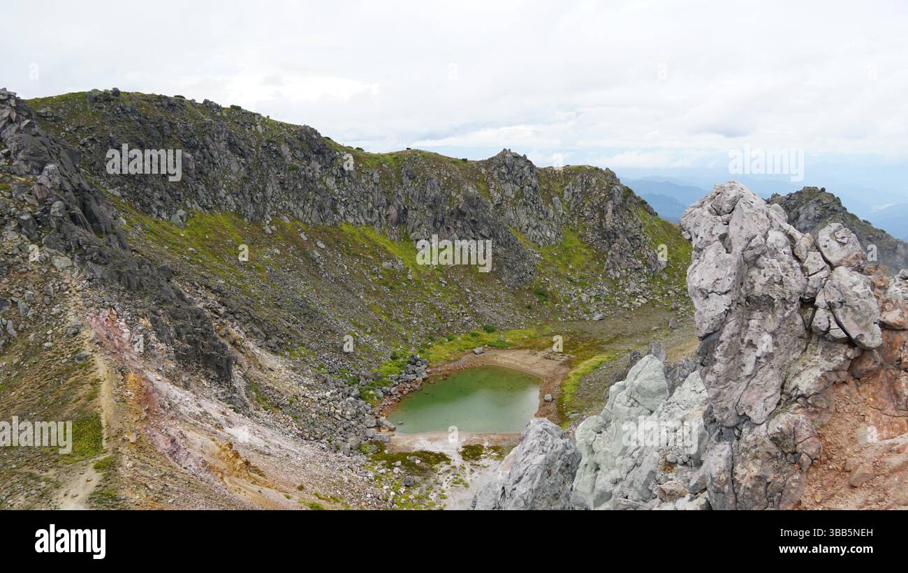 Summer Hiking Adventure on Mt. Yakedake in Kamikochi, Japan Stock Photo ...