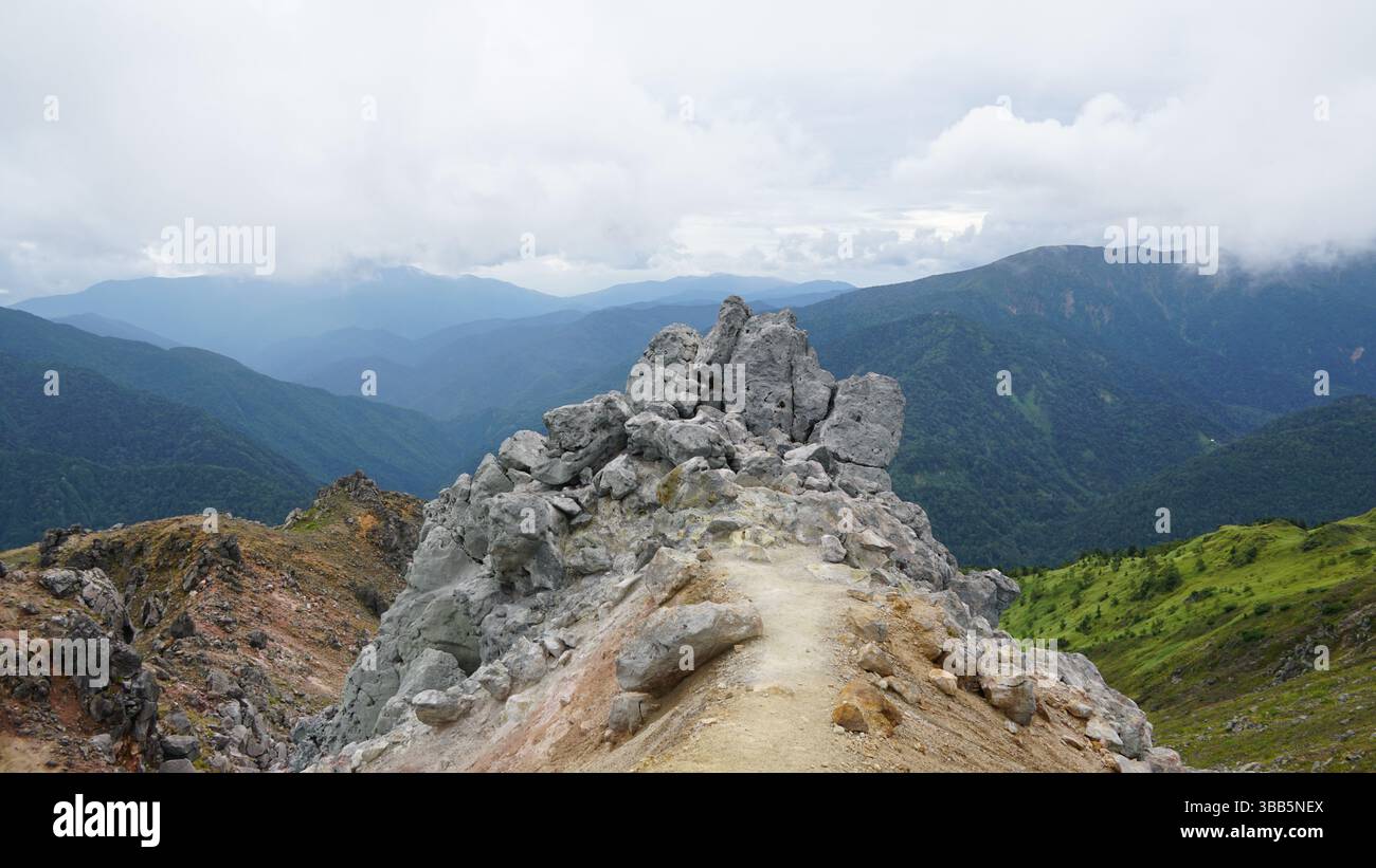 Summer Hiking Adventure on Mt. Yakedake in Kamikochi, Japan Stock Photo ...