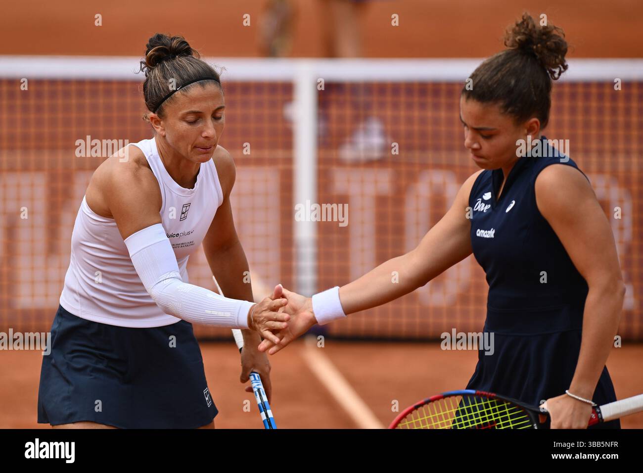 Sara Errani (ITA) and Jasmine Paolini (ITA) in action against Coco ...