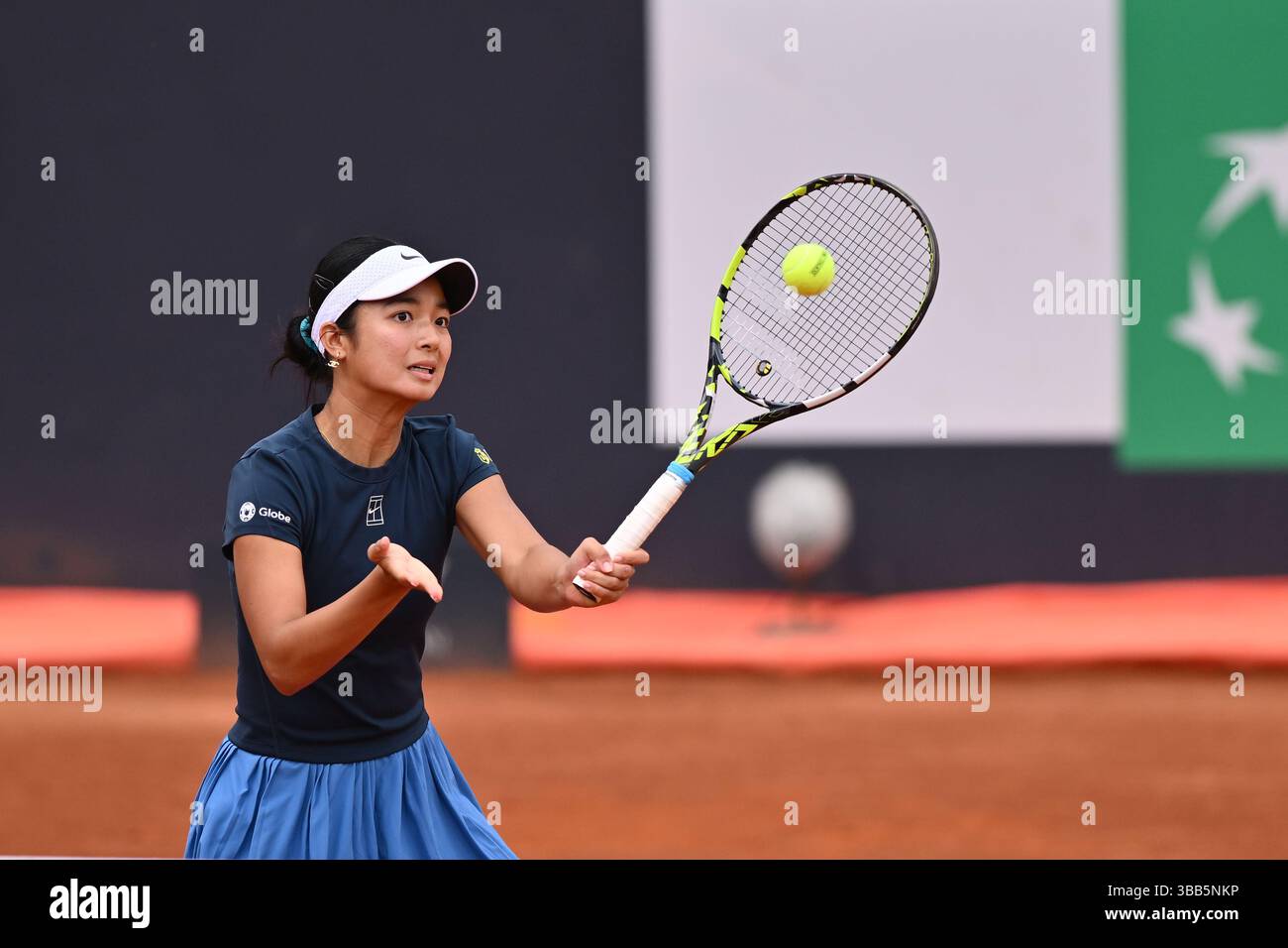 Coco Gauff (USA) and Alex Eala (PHL) in action against Sara Errani (ITA ...