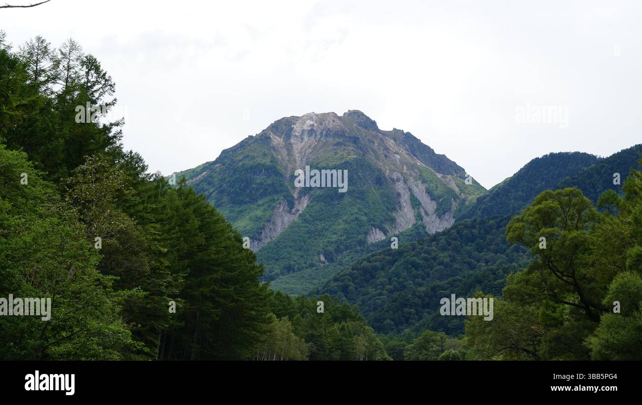 Summer Hiking Adventure on Mt. Yakedake in Kamikochi, Japan Stock Photo ...
