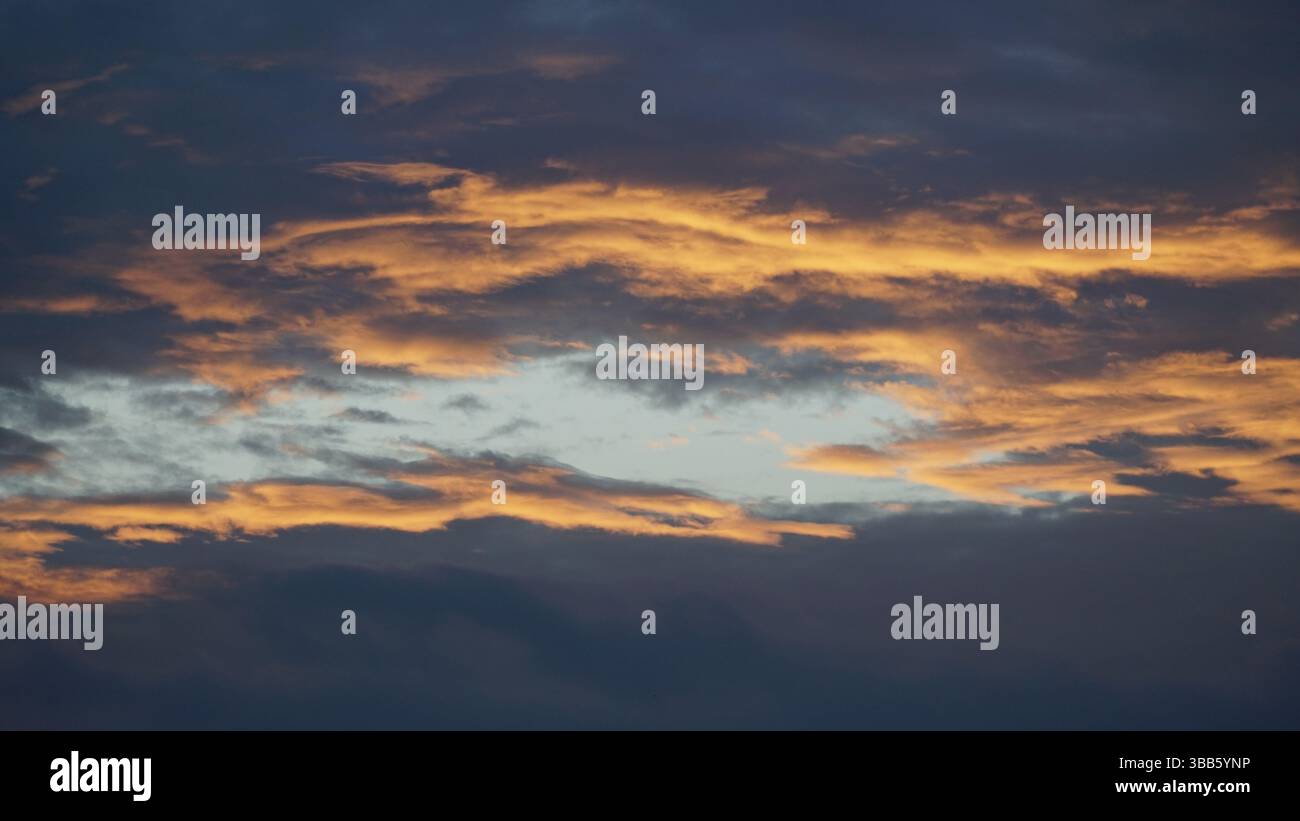 Clouds and Sunset Glow — Stunning Evening Sky Scenery Stock Photo - Alamy