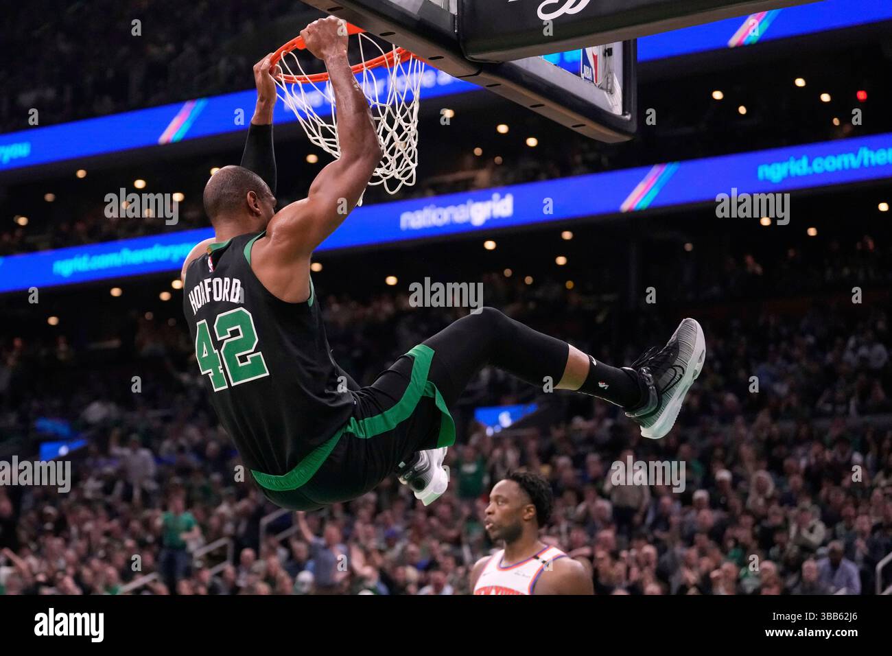 Boston Celtics center Al Horford (42) dunks against the New York Knicks ...