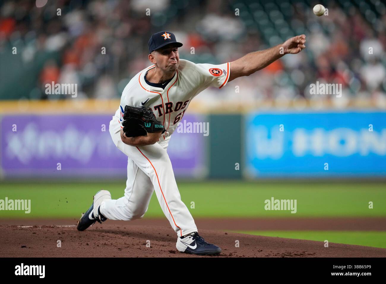 Houston Astros starting pitcher Colton Gordon throws during the first ...