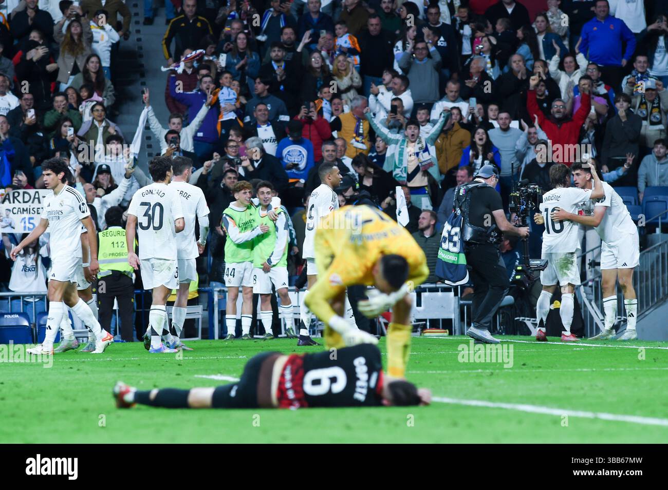 Madrid, Spain. 14th May, 2025. Jacobo Ramon (1st R) of Real Madrid ...