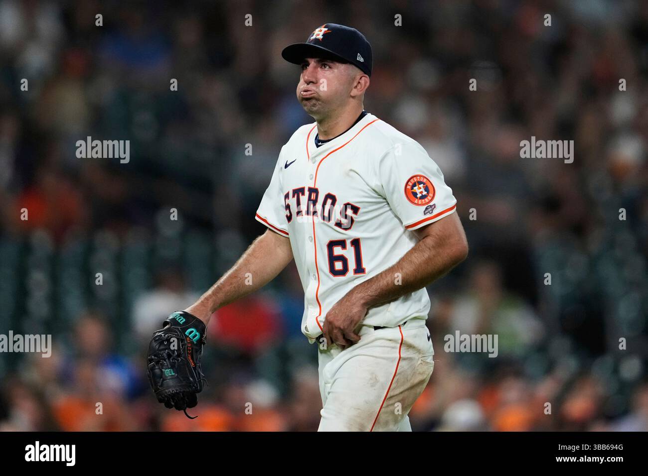 Houston Astros starting pitcher Colton Gordon returns to the dugout ...